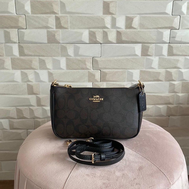 Jual Coach top handle pouch in signature | Shopee Indonesia