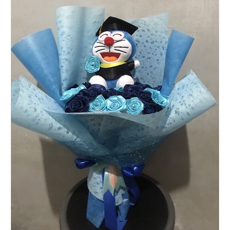 Jual Buket bunga boneka doraemon wisuda / graduation | Shopee Indonesia