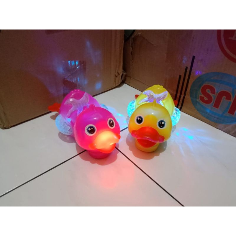 Jual Mainan bebek berjalan bump n go lampu dan musik mainan anak anak ...