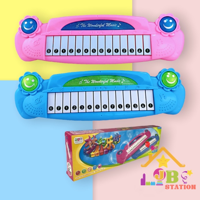 Jual Mainan Keyboard Piano Organ Anak Lampu dan Lagu 2 Warna Dapat Box ...