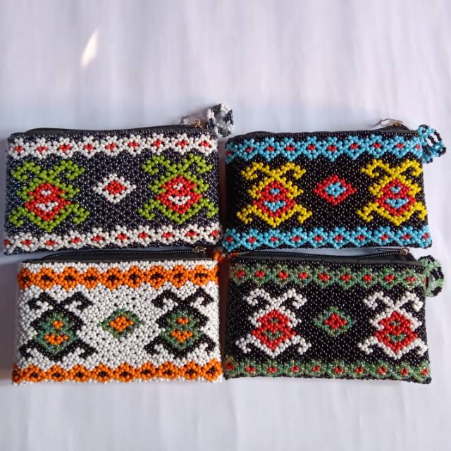 Jual Paket 7 Dompet manik kecil motif dayak khas kalimantan | Shopee ...