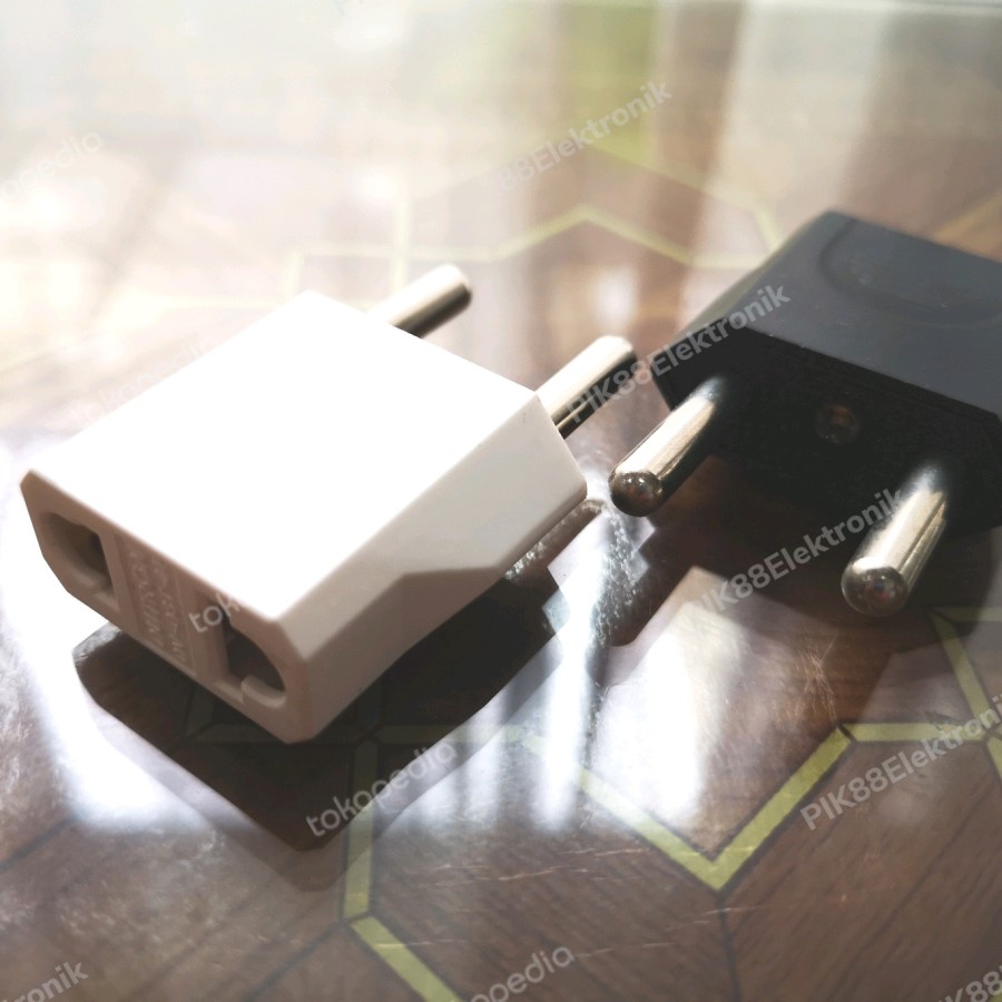 Jual Adapter konverter travel colokan US to EU plug colokan model bulat ...