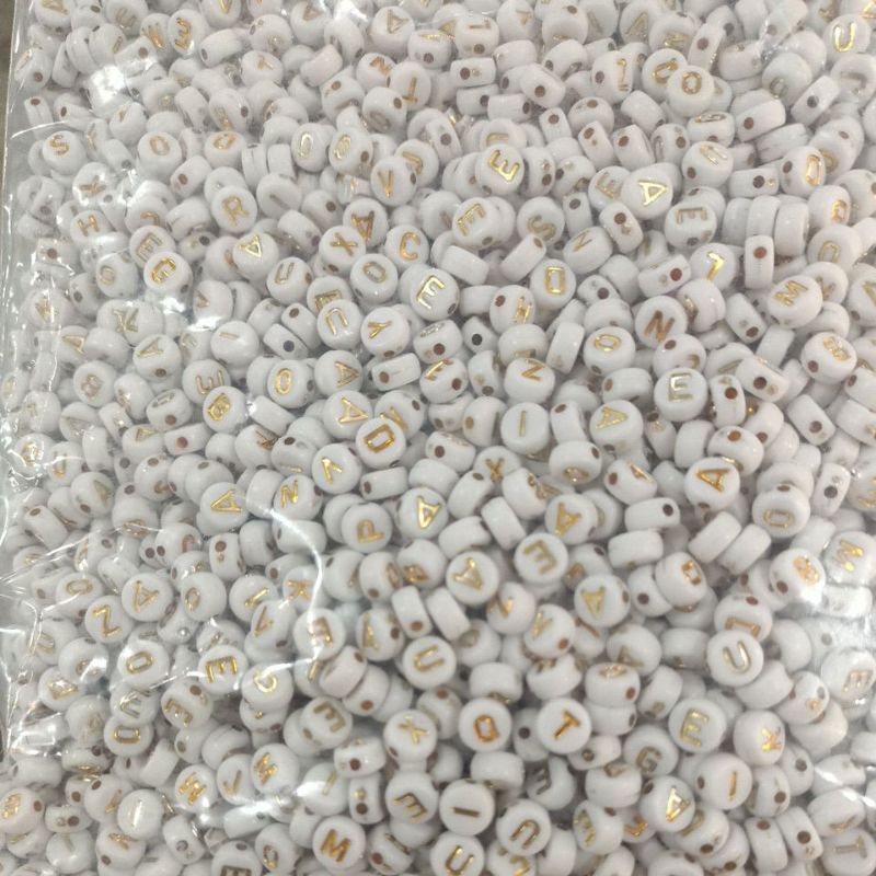 Jual Manik mote bulat pipih putih huruf emas isi 1pon | Shopee Indonesia